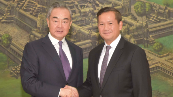 Назначенный премьер министр Камбоджи Хун Манет встретился с министром иностранных дел КНР Cgtn